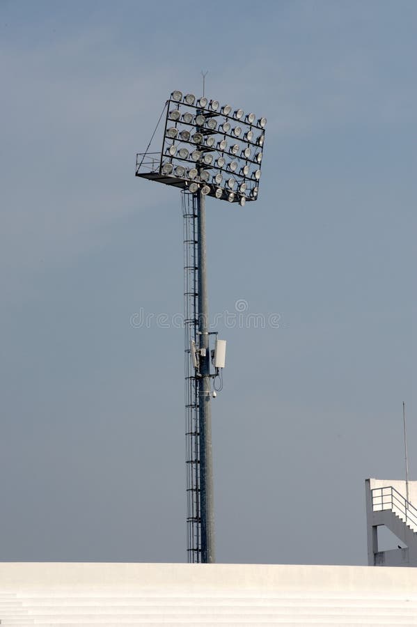 Stadium lighting poles. stock photo. Image of bright - 83576142