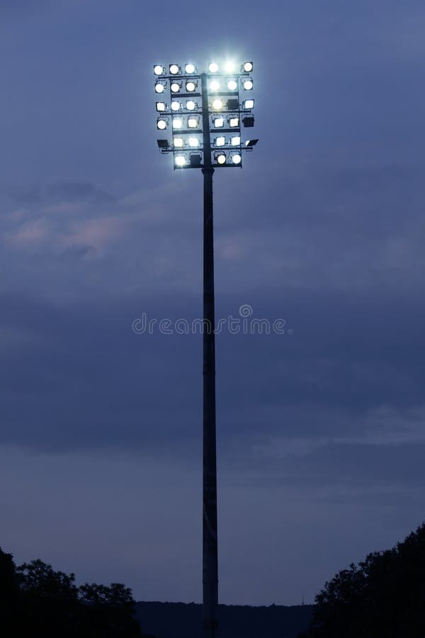 Stadium lights stock image. Image of vertical, illuminate - 19968017