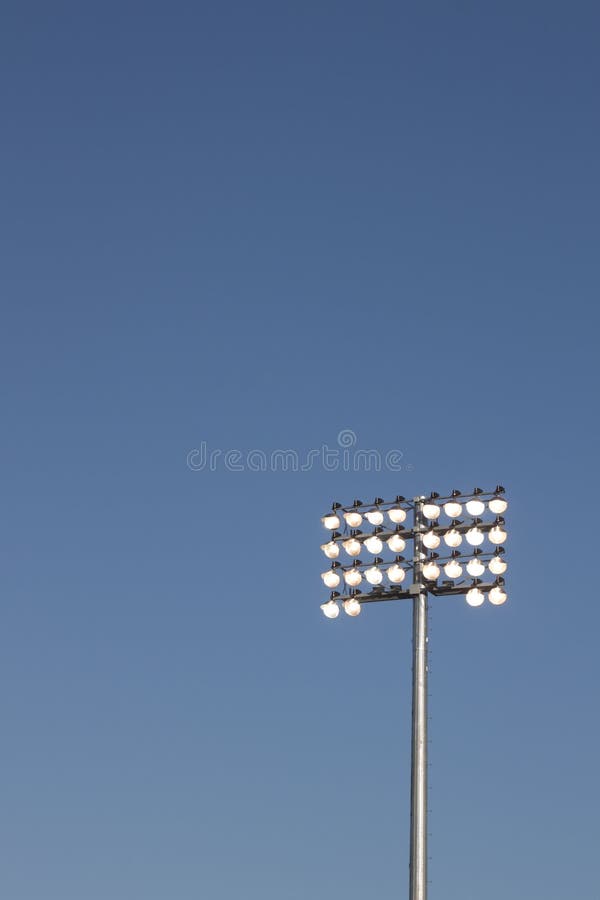 Stadium Lights on a Blue Sky Background Stock Photo - Image of energy ...