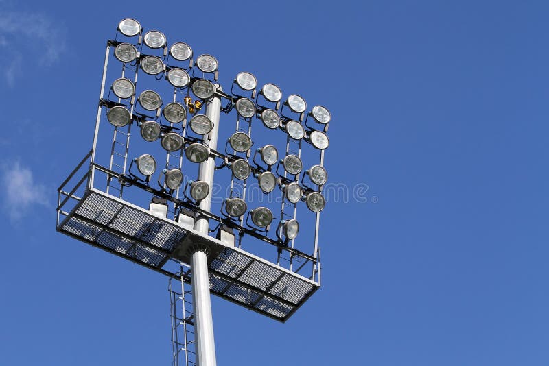 Stadium Lights on a Blue Sky Background Stock Image - Image of high ...