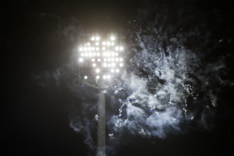 Stadium lights and smoke stock image. Image of blue, lamp - 61025989