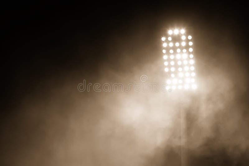 Stadium lights and smoke stock image. Image of power - 61026983