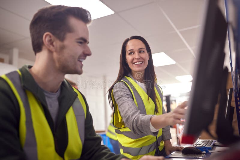 Staff in Busy Modern Warehouse Working on Computer Terminals Stock ...