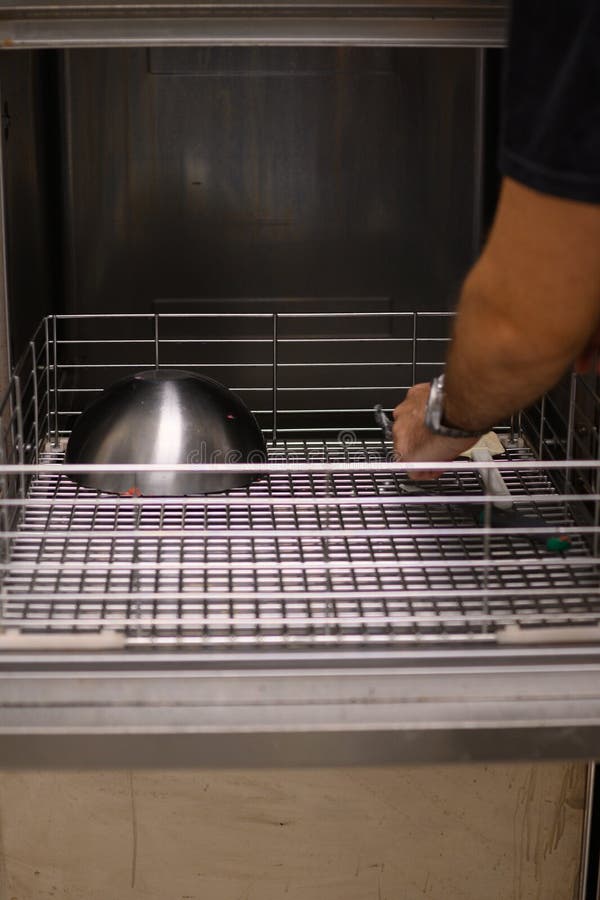 Staff Cleaning Professional Cook Appliances and Ware in Professional ...