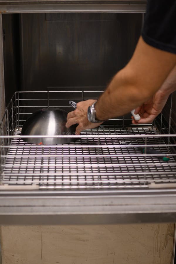 Staff Cleaning Professional Cook Appliances and Ware in Professional ...