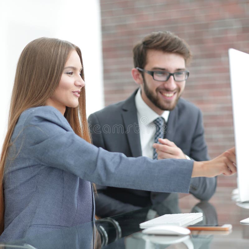 Colleagues Discussing Information on a Computer Stock Image - Image of ...