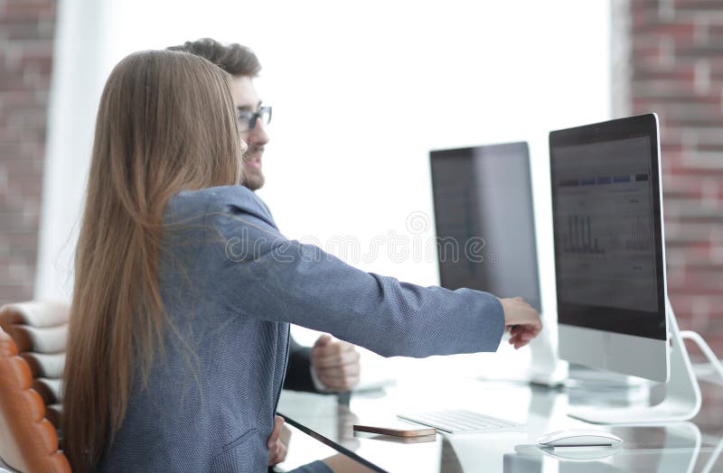 Colleagues Discussing Information on a Computer Stock Image - Image of ...