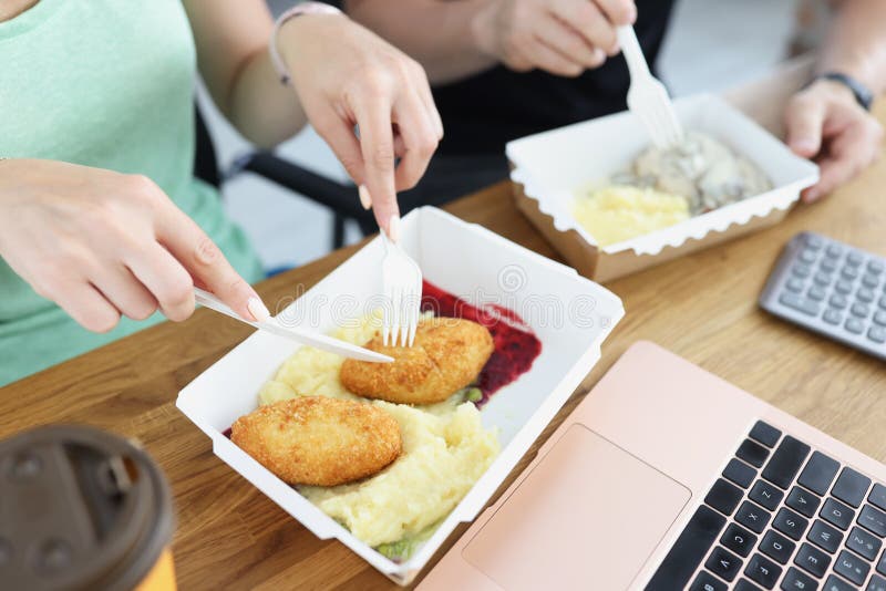 Staff Eating Cutlets with Mashed Potatoes from Cardboard Boxes in ...