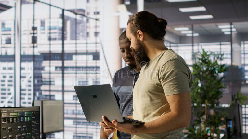 It Staff Members in Office Analyzing and Interpreting Complex Data ...