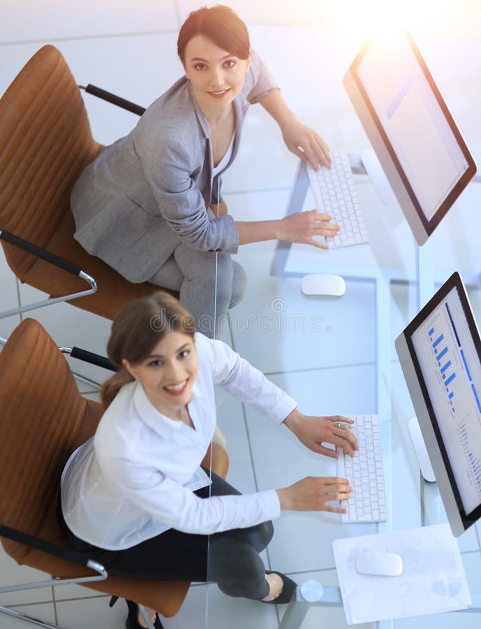 Staff of the Planning Department Sitting Behind a Desk and Looki Stock ...