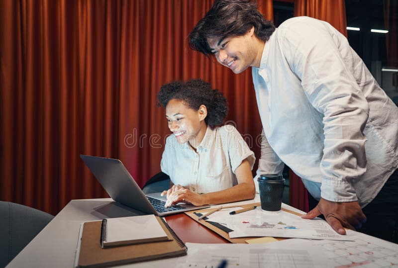 Staff Preparing Documents for Presentation on Laptop Stock Photo ...