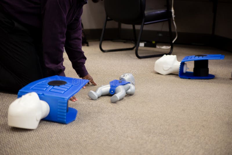 Staff Putting Medical Gloves for First Aid Training Stock Photo - Image ...