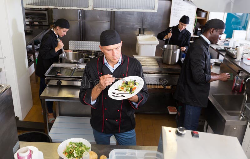Staff of Restaurant with Chef Working Stock Photo - Image of kitchen ...