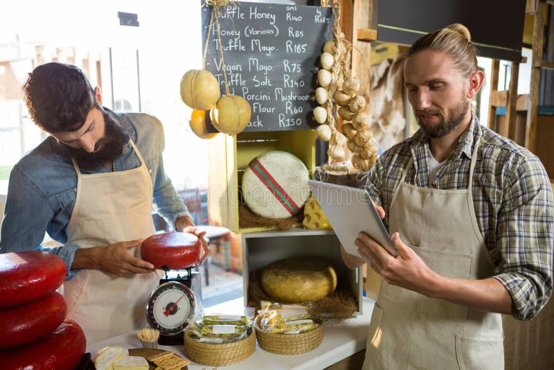 Staff Using Digital Tablet at Counter Stock Photo - Image of lifestyle ...