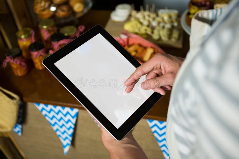 Staff Using Digital Tablet in Grocery Shop Stock Photo - Image of sell ...