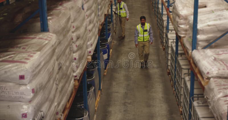 Staff Working in a Warehouse Storage Bay 4k Stock Video - Video of ...