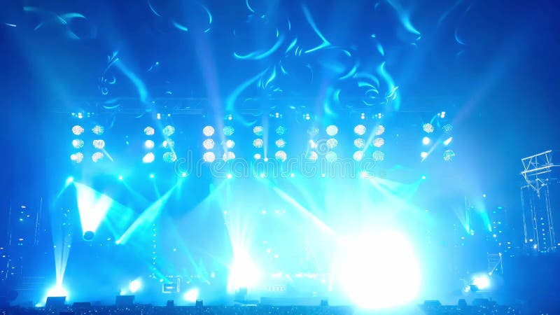 A Stage with Blue Lights and a Spotlights, Set for a Performance Stock ...
