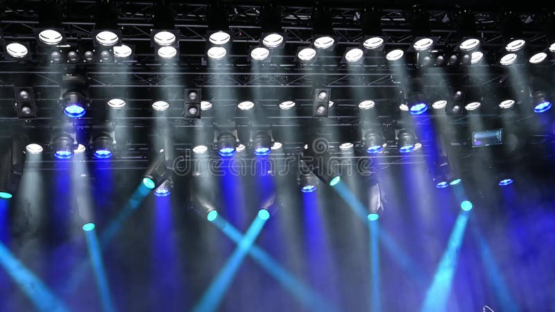 Bright Blue Ceiling Spotlights Lights through the Stage Fog Stock ...