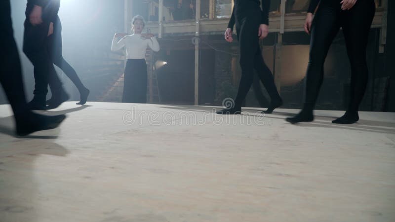 Stage Director Walking in Backlit Talking with Unrecognizable Actors ...