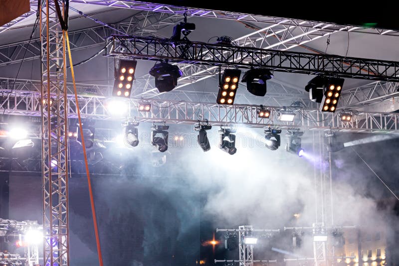 Stage Lights at Concert. Illuminated Stage with Lights and Smoke Stock ...