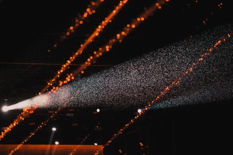 Stage lights in the rain stock image. Image of dark - 246743115