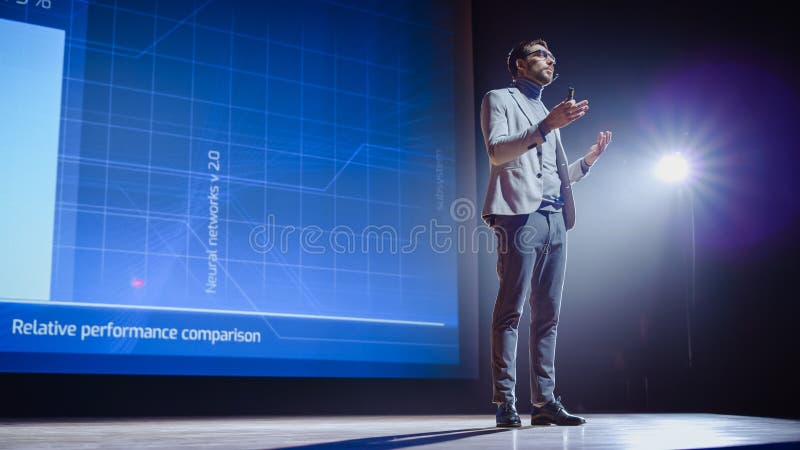 On-Stage: Speaker Does Presentation of the New Electronic Product ...
