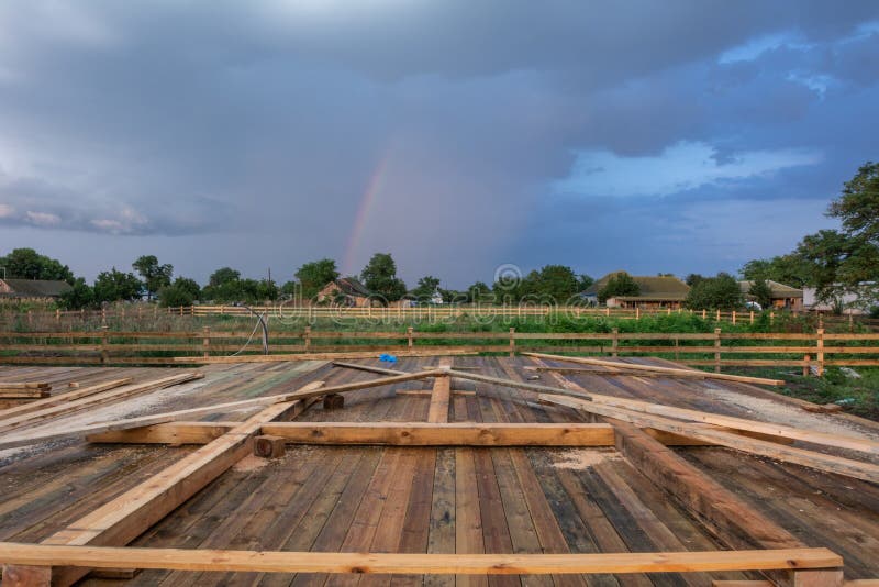 Stages of Construction of a Wooden Frame House with a Triangular Type a ...