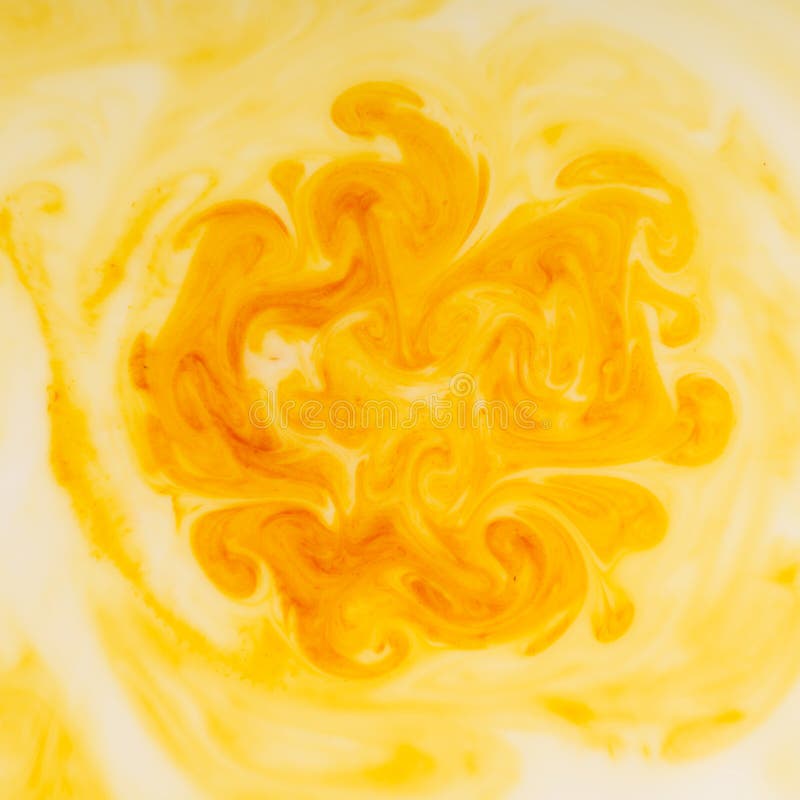 A Stain of Paint Dissolved in a White Liquid Closeup. View from Above ...