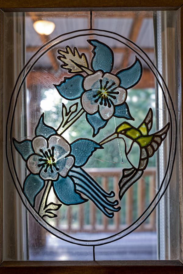A Stained Glass Hanging Window Panel of a Hummingbird and Flowers with ...