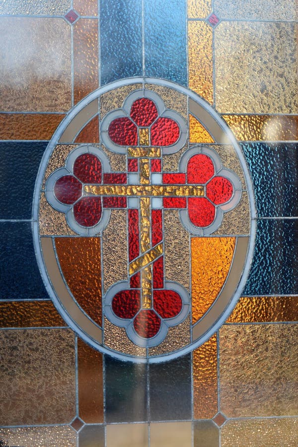 Stained Glass Window with a Cross on the Background of Stained Glass ...
