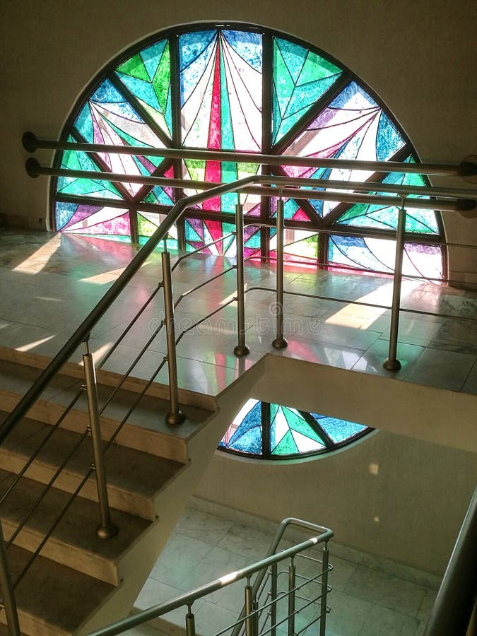 Stained Glass Window and Light Colored Spots on the Stairs. Stock Image ...