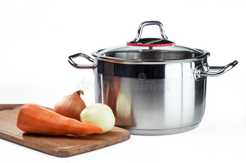Stainless Cooking Pot with Vegetables on a Cutting Board Stock Photo ...