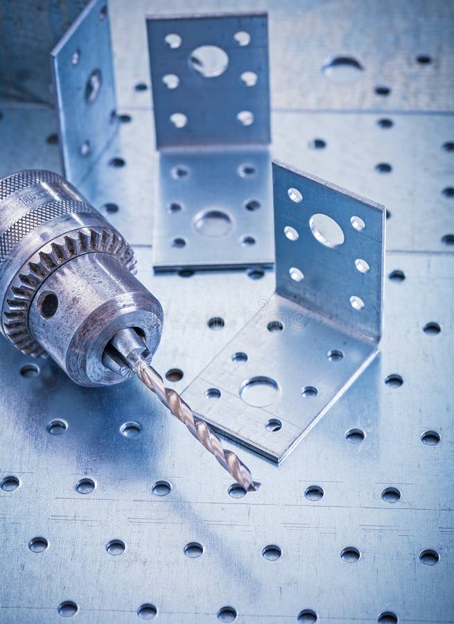 Stainless Perforated Angle Fasteners on Metallic Stock Photo - Image of ...