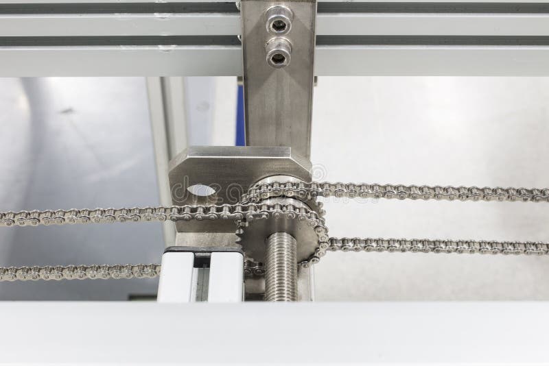 The Stainless Gear and Chain Drive Shaft in Conveyor. Stock Image ...