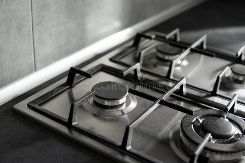 Stainless Grey Metal Kitchen Gas Stove Installed on a the Kitchen with ...