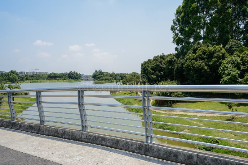 Stainless Handrail of Bridge Over River in Sunny Summer Stock Photo ...