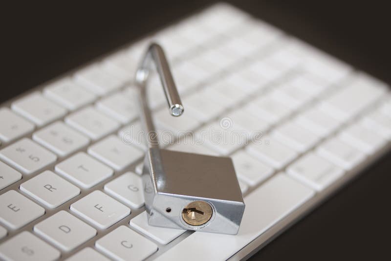 Stainless Padlock on Computer Keyboard. PC Network Security, Data ...