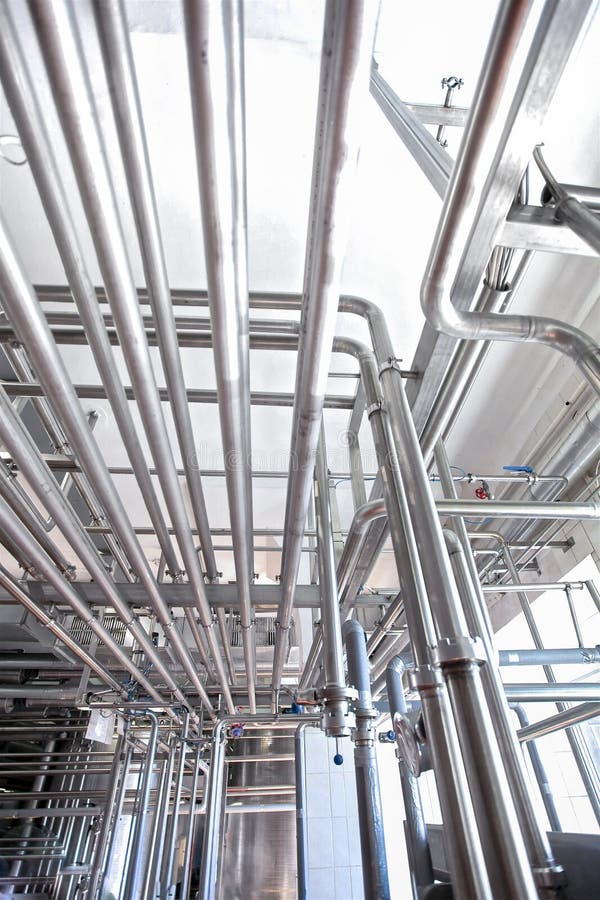 Stainless pipes in factory stock image. Image of liquid - 68078263