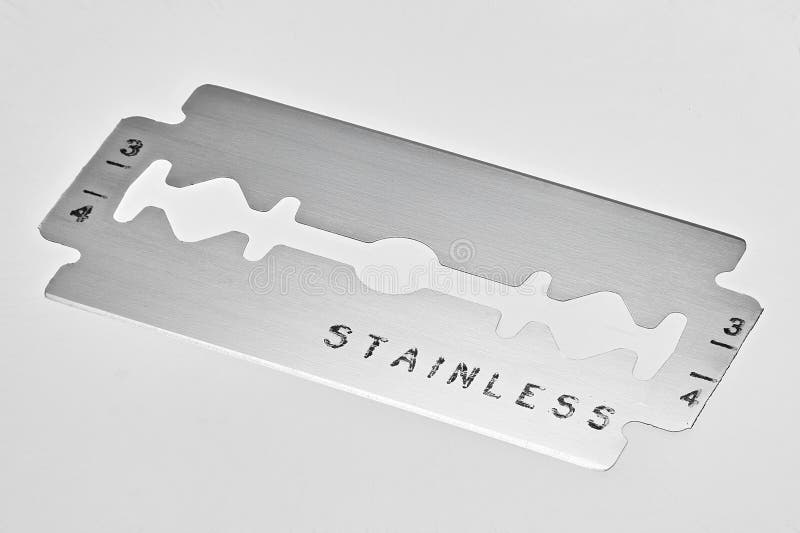 Stainless Razor Blade on Grey Background Stock Photo - Image of word ...