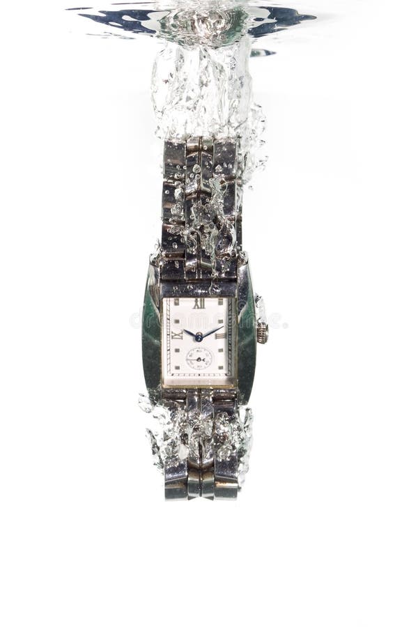 A Stainless Steel Analog Watch Falling in Water Stock Image - Image of ...