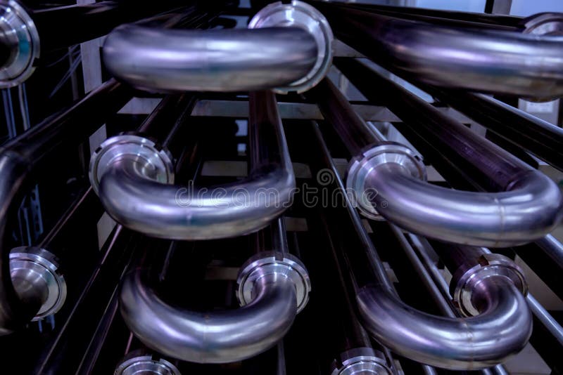 Stainless steel coil pipes stock image. Image of mechanical - 80526735