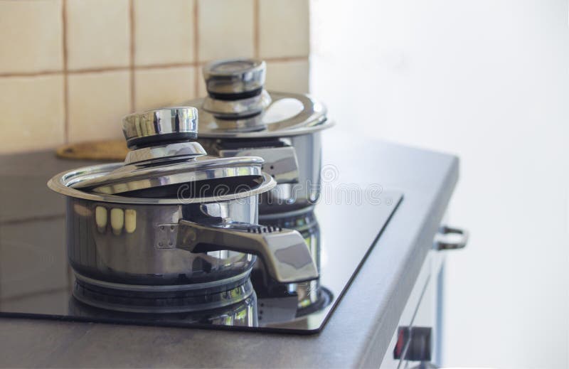 Stainless Steel Cooking Pot on a Stove Stock Photo - Image of ...