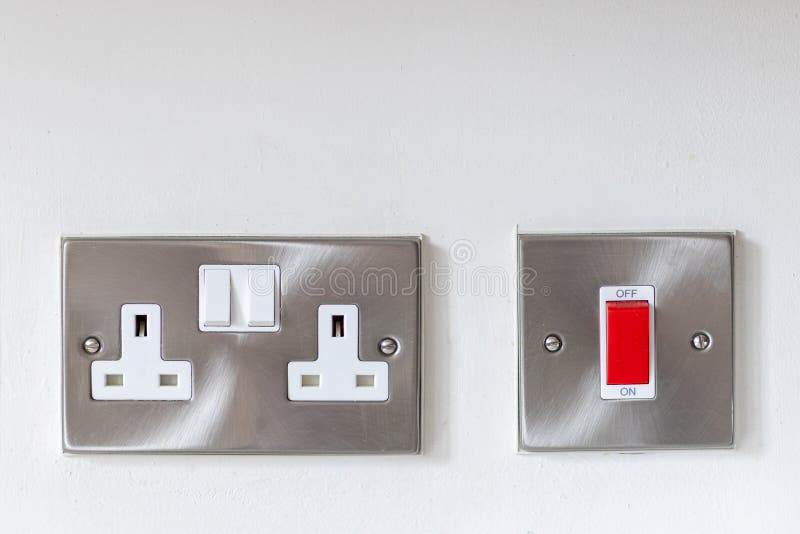Stainless Steel Electric Double Socket and Red on/off Switch Mounted on ...