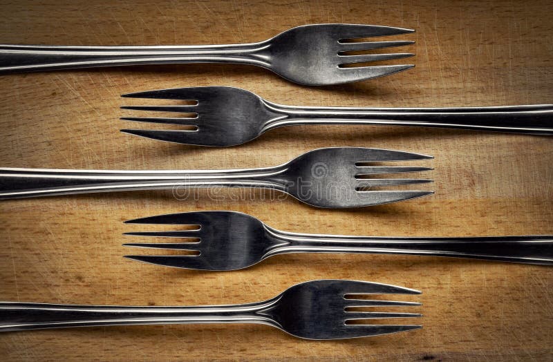 Stainless Steel Fork on Cutting Board Stock Photo - Image of utensil ...