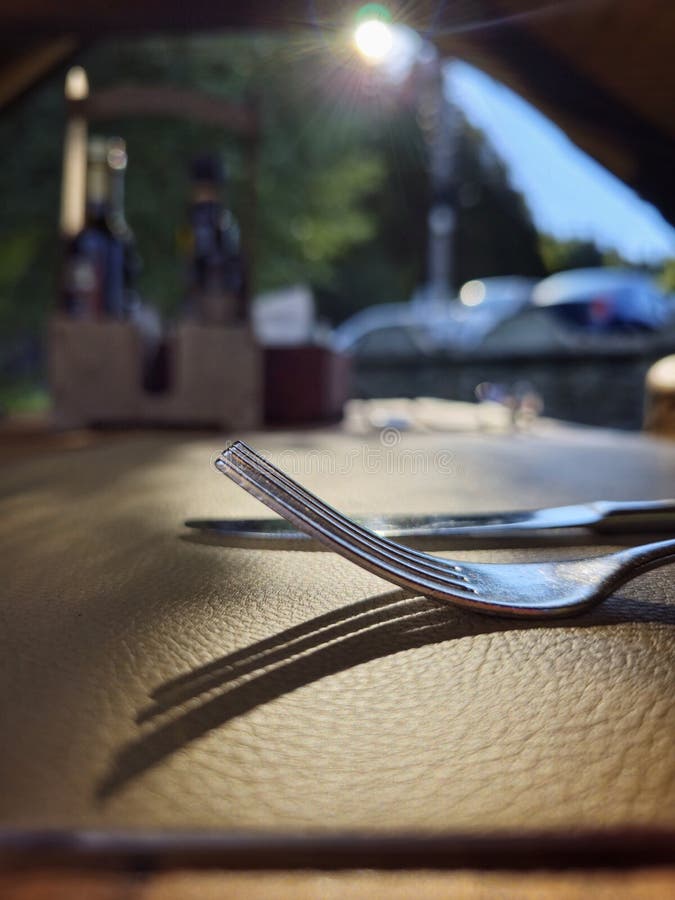 Stainless Steel Knife and Fork on a Table Stock Photo - Image of steel ...