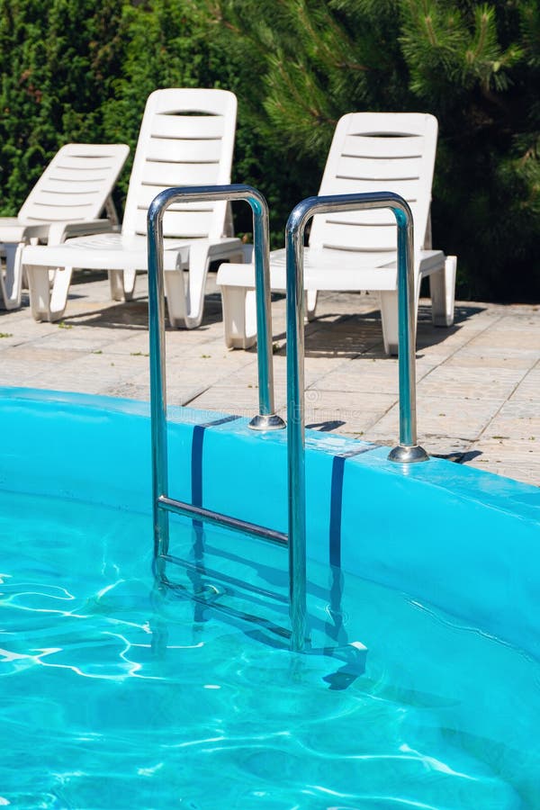 Stainless Steel Ladder in a Water Pool Stock Photo - Image of ladder ...