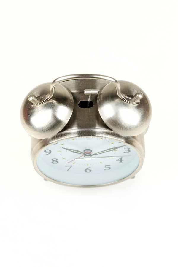 Stainless Steel Old Fashioned Alarm Clock on a White Background Stock ...