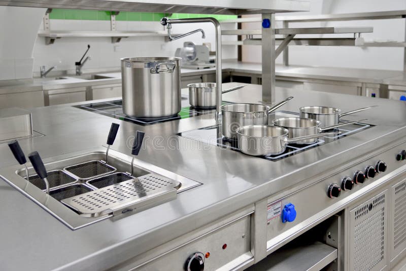 Stainless Steel Pots Built on the Stove in the Restaurant Kitchen Stock ...