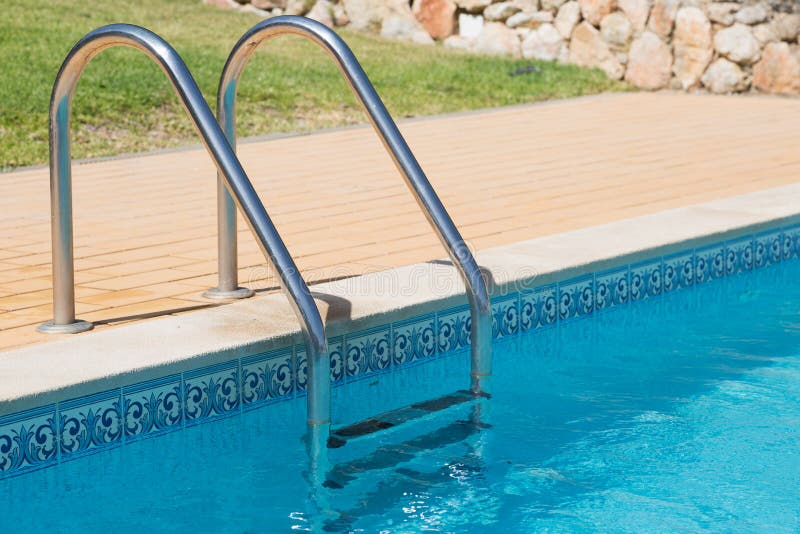 Stainless Steel Steps Leading into Swimming Pool Stock Photo - Image of ...