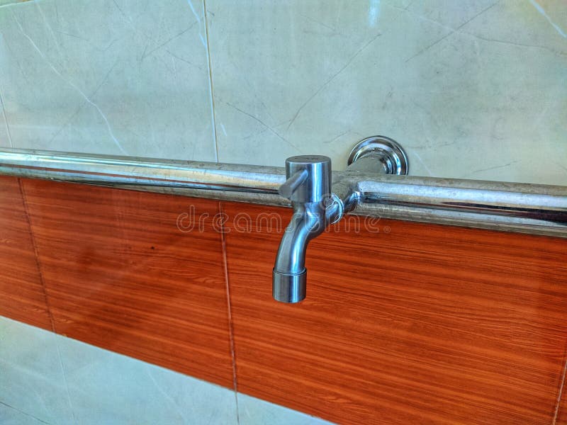 Stainless Steel Water Faucet on the Wall Stock Photo - Image of vehicle ...